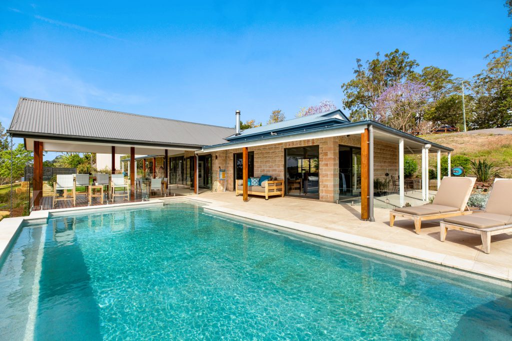 Choosing the Perfect Pool Pebble Finish in Queensland | JM Homes
